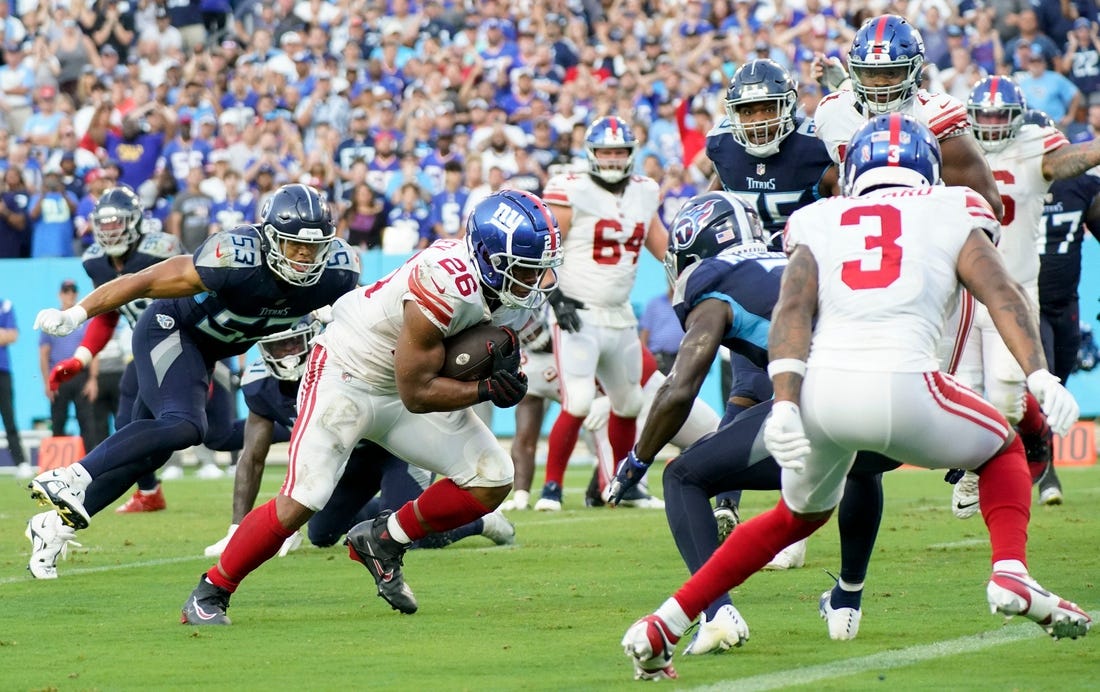 NFL: Giants rally, score two-point conversion to stun Titans