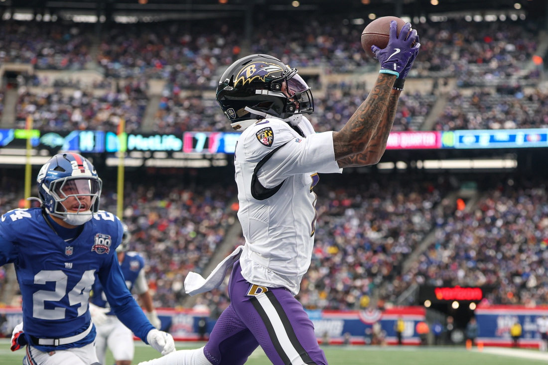NFL: Ravens WR Rashod Bateman wearing a walking boot